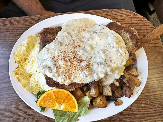 This chicken fried steak doesn't just come with gravy&mdash;it's swimming in a pool of creamy heaven that deserves its own Olympic medal.