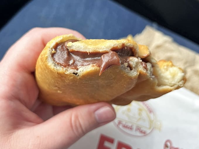 Chocolate oozing from golden crust creates that perfect moment of anticipation. Some treasures are meant to be discovered one bite at a time.