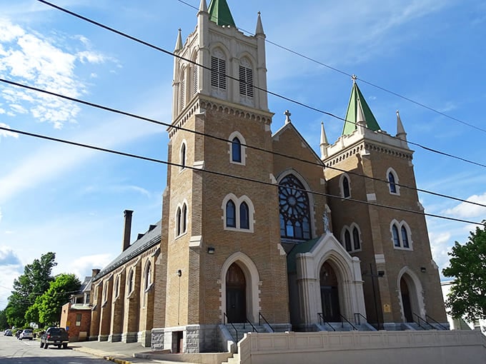St. Athanasius & St. John Church reaches skyward with twin spires, a spiritual landmark that's been witnessing Rumford weddings, baptisms and Sunday best for generations.