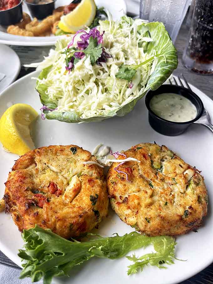 These golden-brown crab cakes are what dreams are made of&mdash;mostly crab, minimal filler, maximum flavor. Served with slaw that's actually worth eating.
