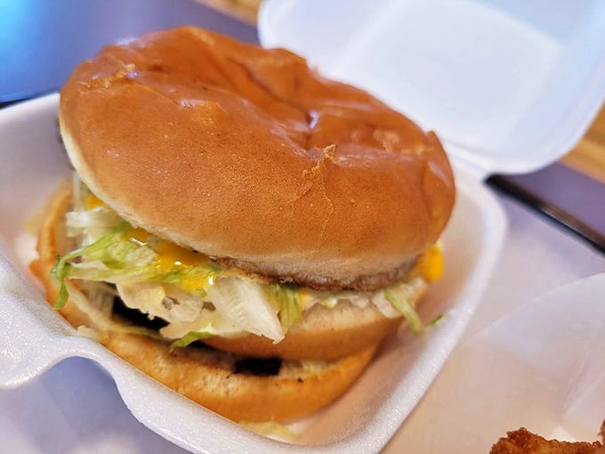 Behold the humble hero of Louisville lunch breaks&mdash;a perfectly proportioned burger where every element plays its part in the symphony of satisfaction.