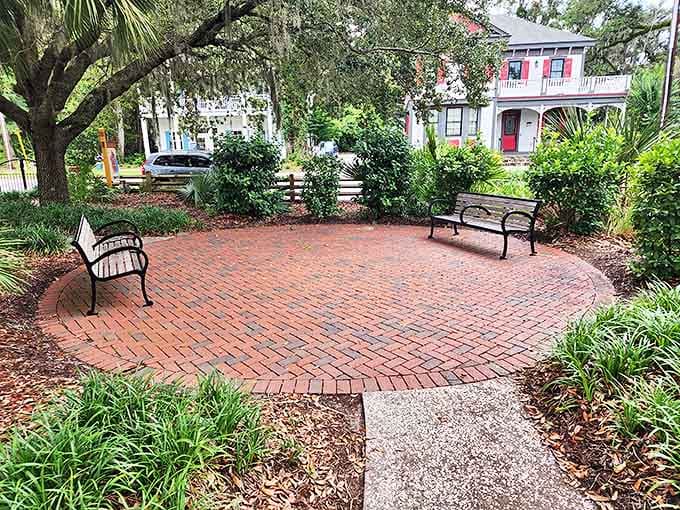DuBois Park's brick-paved sanctuary offers a moment of repose beneath towering oaks, where benches await storytellers and daydreamers alike.