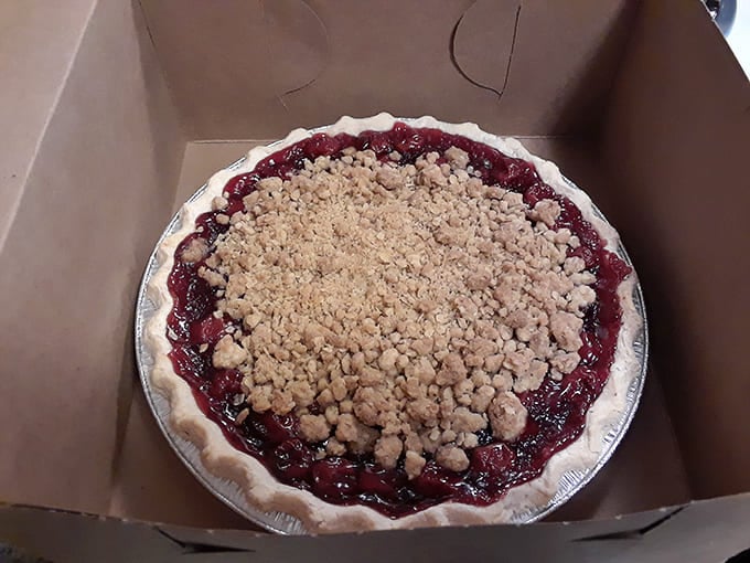 This cherry crumble pie isn't just dessert; it's edible architecture with a perfect balance of sweet fruit and buttery topping.