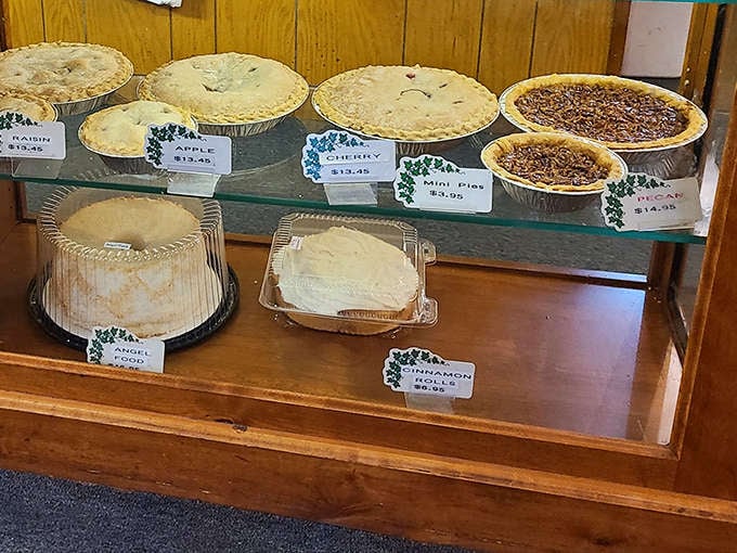 Heaven's waiting room might just be this pie display case, where flaky crusts and perfect fillings make decisions deliciously difficult.