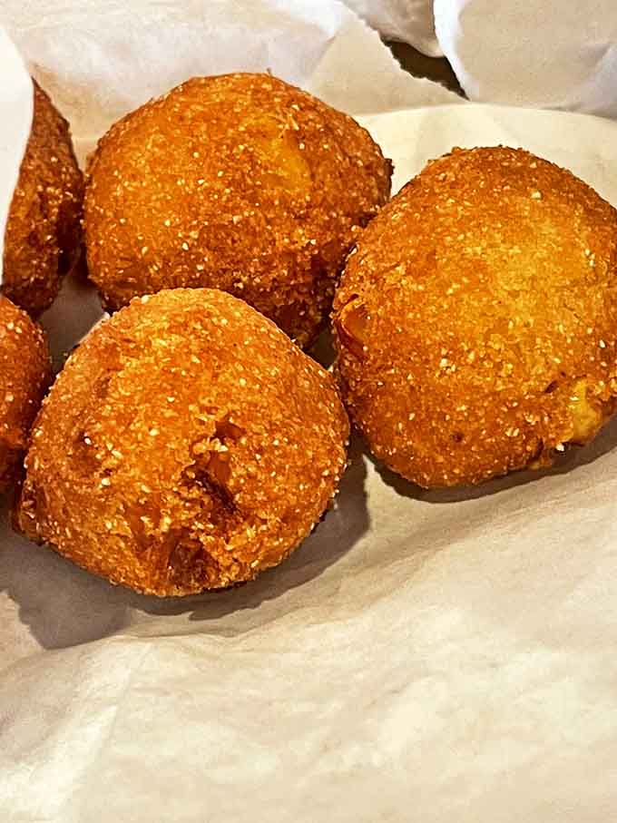 Golden orbs of cornmeal perfection that would make your grandmother both jealous and proud. Crispy exterior, fluffy soul.