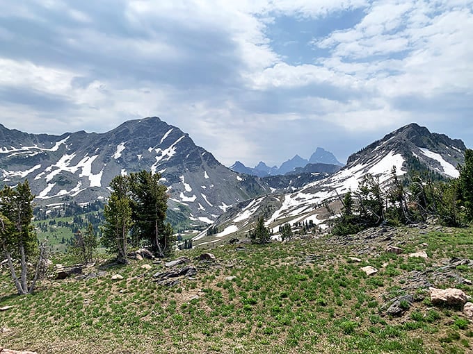 The Tetons rise like nature's cathedral, making even the most dedicated atheist whisper "Oh my God" at first glance.
