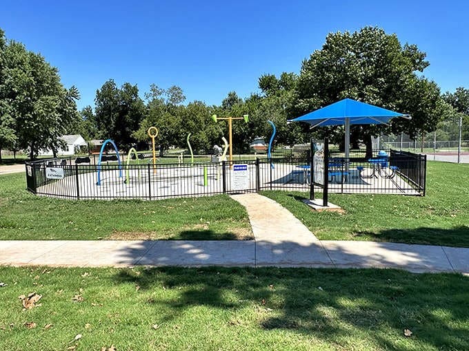This colorful splash pad is Perry's summer social hub, where kids cool off while parents pretend they're not jealous of the fun.