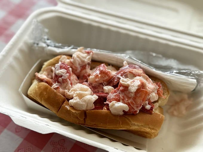 Maine's edible masterpiece: chunks of sweet lobster meat barely held together with mayo, cradled in a perfectly toasted split-top bun.