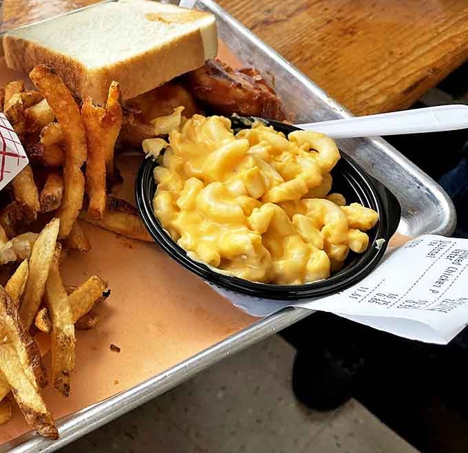 Mac and cheese that doesn't try to reinvent itself with truffle oil or artisanal cheese&mdash;just creamy, comforting perfection alongside crispy fries.