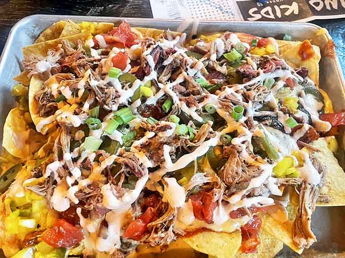 Not your average ballpark nachos! These loaded beauties come piled high with pulled pork, fresh veggies, and enough cheese to make Wisconsin proud.