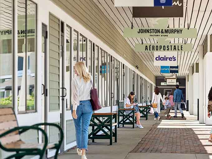 Shopping becomes a promenade when the walkways are this inviting. The benches aren't just seating&mdash;they're relationship-saving rest stops for weary companions.
