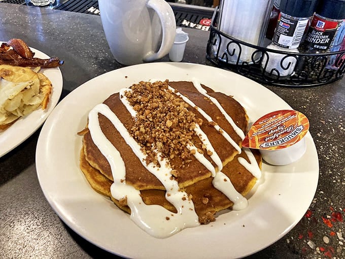 These pancakes aren't just breakfast, they're an event&mdash;golden-brown perfection crowned with cream and crumble that would make grandma jealous.