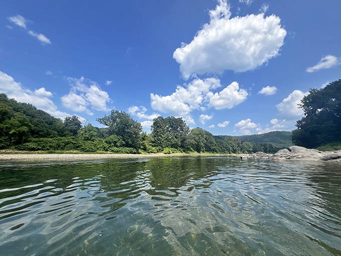 Crystal clear waters reflecting Vermont's blue skies. This swimming hole isn't just refreshing&mdash;it's nature's perfect answer to summer heat.