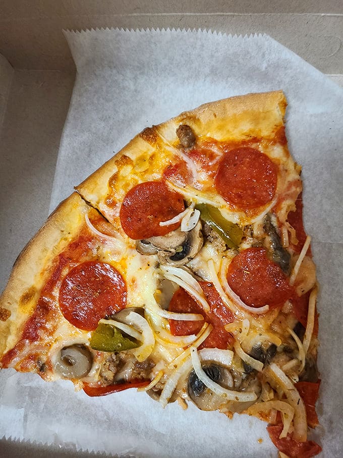 Pizza perfection doesn't need fancy words&mdash;just look at that melty cheese, those crisp pepperoni cups, and the medley of toppings playing harmony on a golden crust.