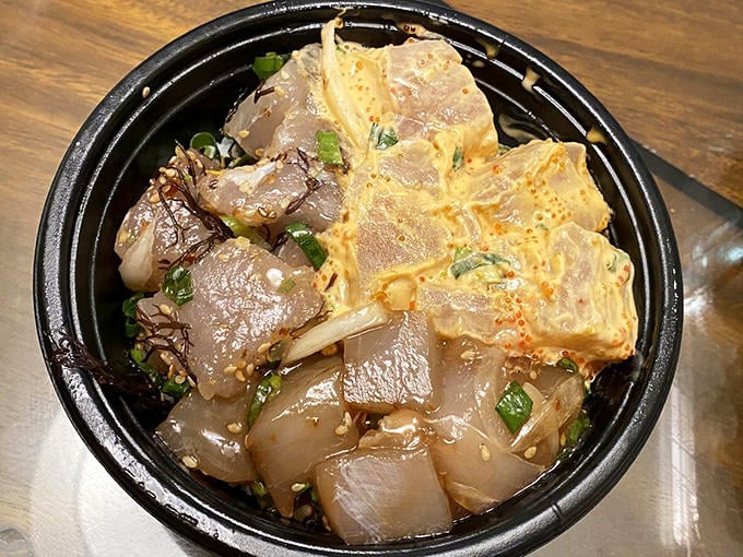 This poke bowl isn't just food&mdash;it's edible art. Glistening cubes of fresh ahi tuna that practically whisper "eat me" with every bite.