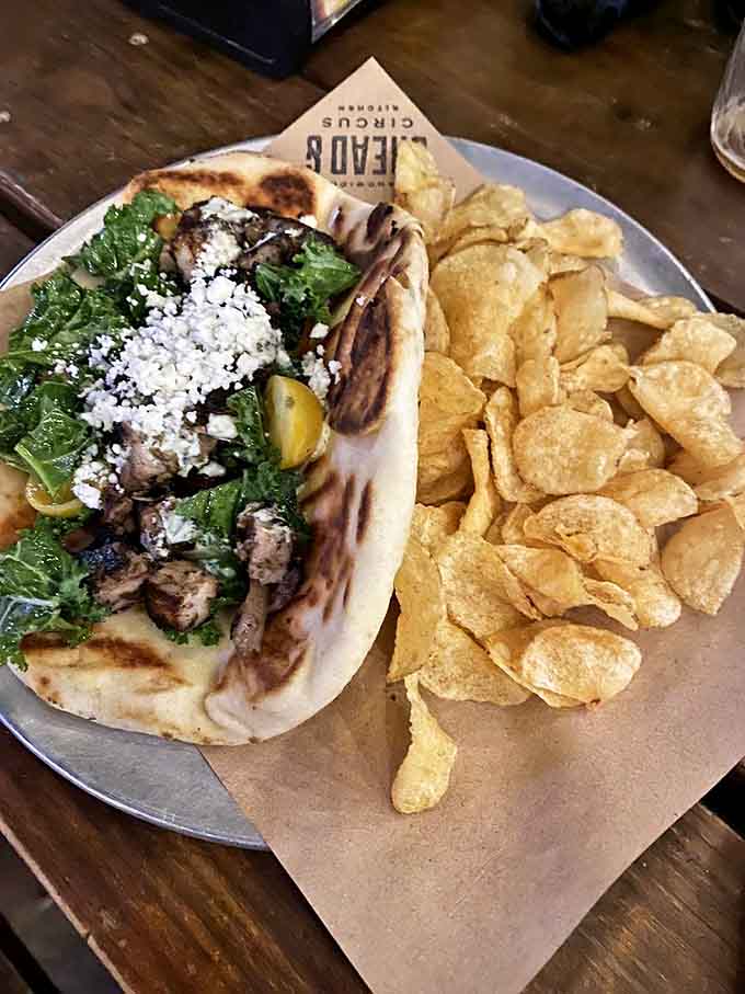 This isn't just a gyro; it's a revelation of perfectly charred meat, fresh greens, and feta cheese that would make Zeus himself descend from Olympus for a bite.