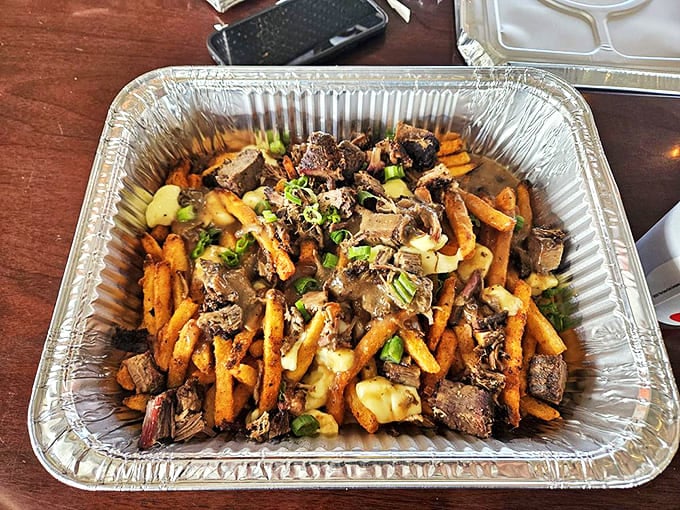 Behold the loaded fries that make dietitians weep and food lovers rejoice. Crispy potatoes, tender brisket, and melty cheese create the holy trinity of comfort.