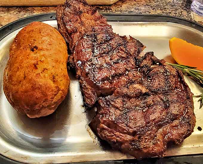 Behold the star of the show! This prime rib and twice-baked potato combo isn't just dinner&mdash;it's the reason stretchy pants were invented.