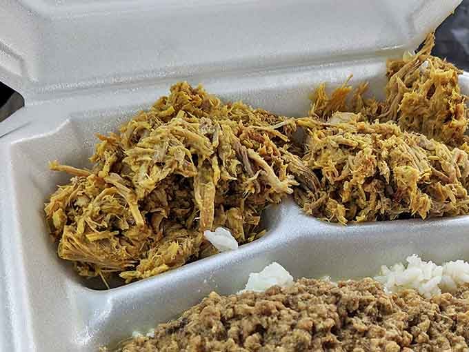 Pulled pork so tender it practically melts, paired with that legendary hash. This isn't just lunch—it's a South Carolina cultural experience on a styrofoam plate.