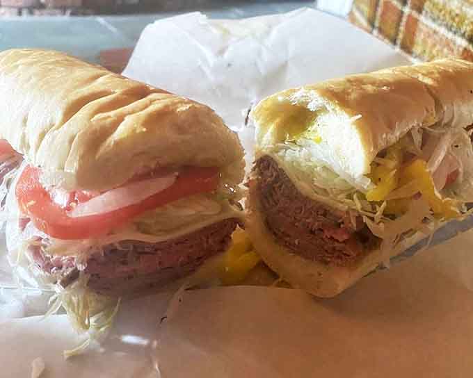 Behold the roast beef grinder in all its glory&mdash;where thinly sliced perfection meets fresh veggies in a dance of deliciousness.