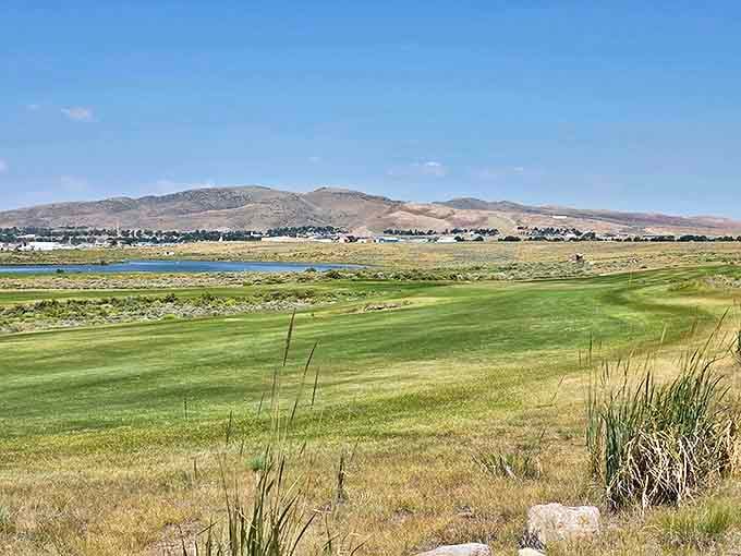 Rawlins' golf course stretches toward distant mountains, where the challenge isn't just the course but keeping your eye on the ball amid spectacular views.