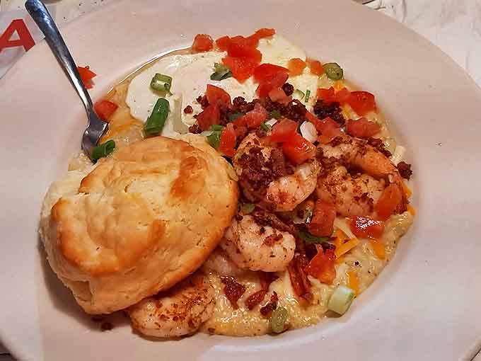 Shrimp and grits that could make a seafood skeptic weep with joy. That biscuit isn't just a side&mdash;it's the supporting actor deserving its own award.