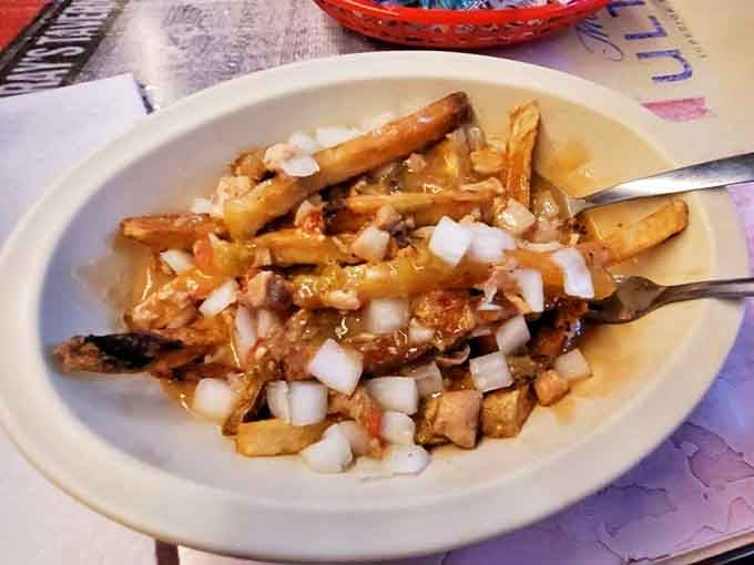 Behold the Slopper in all its golden-fried glory &ndash; chili-covered fries topped with onions and zero regrets.