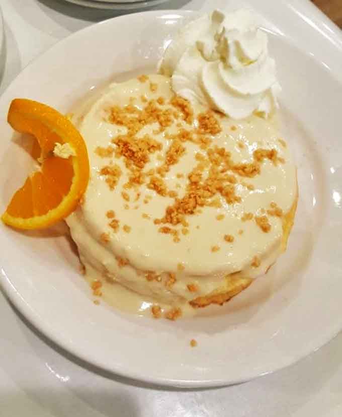 Cloud-like souffle pancakes that make ordinary flapjacks seem like distant, less-evolved cousins. That orange slice is just showing off.