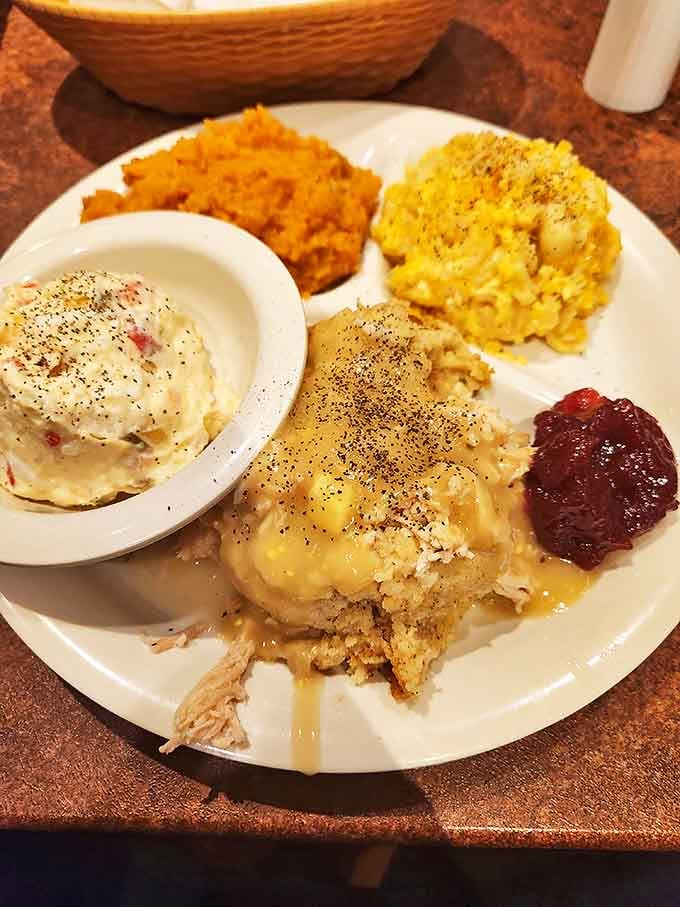 Southern comfort on a plate &ndash; where turkey and dressing meet sweet potato casserole in a reunion that feels like a warm hug.