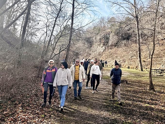 Fellow nature enthusiasts making their pilgrimage to the falls. Like a walking club that accidentally stumbled into paradise instead of the mall.