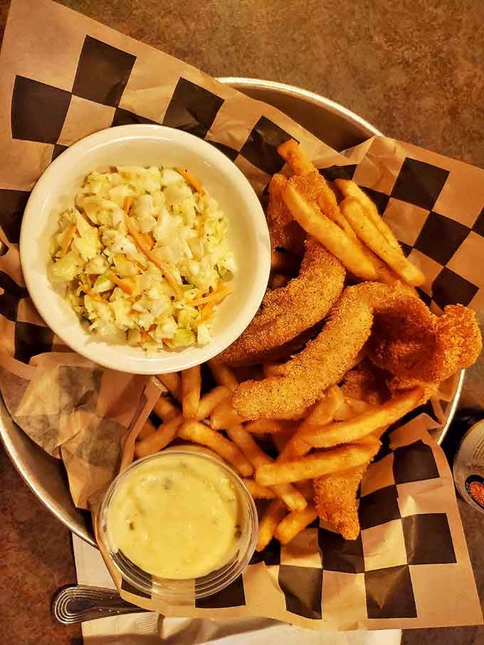 Golden-fried perfection! The catfish arrives with that ideal crunch-to-tenderness ratio that separates the merely good from the truly memorable.