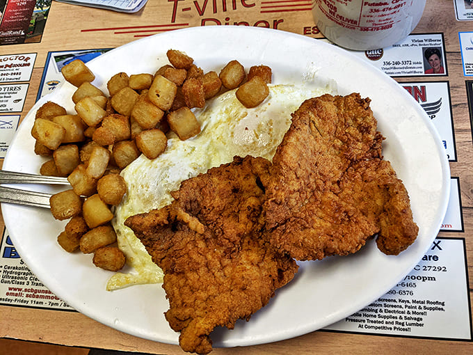 Country-fried steak that could make a vegetarian question their life choices, paired with eggs and home fries crispy enough to hear from across the room.
