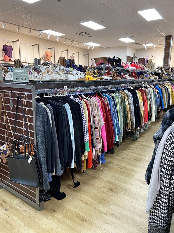 A rainbow of possibilities hangs in perfect order. This isn't your grandmother's jumbled thrift rack&mdash;it's a color-coded fashion buffet waiting to be sampled.