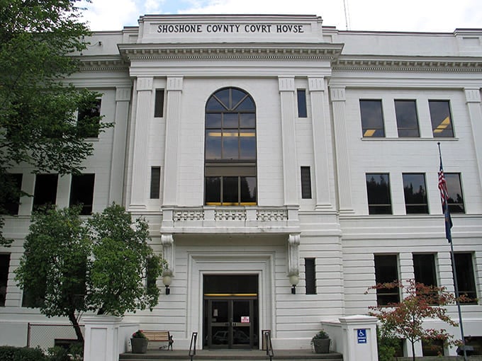 The stately Shoshone County Courthouse stands like a dignified elder statesman. Its gleaming white columns and symmetrical design speak to an era when civic buildings inspired awe.