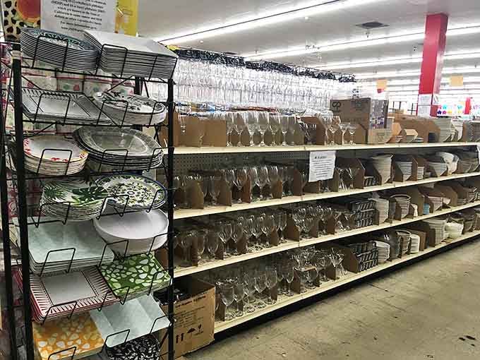 Crystal stemware and patterned plates await their forever homes, like well-dressed guests at a dinner party.
