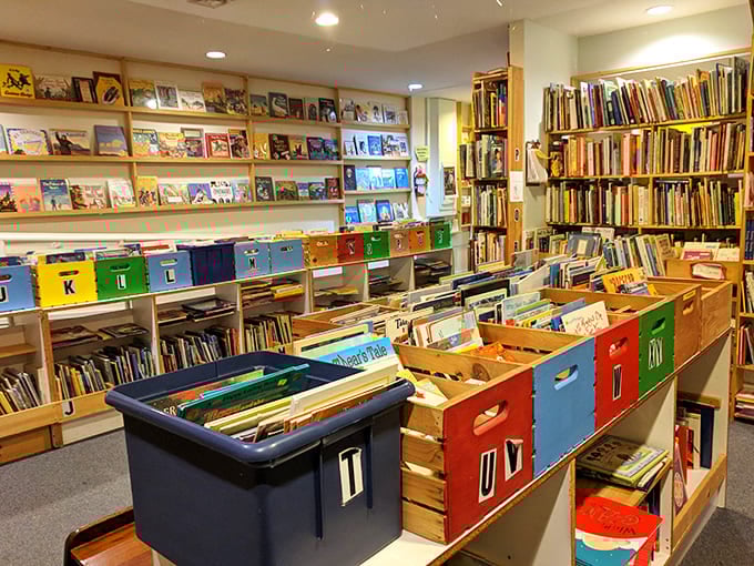The children's section looks like what would happen if Reading Rainbow and Sesame Street collaborated on the perfect literary playground.