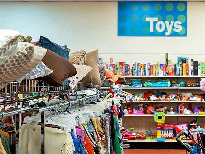 Pink blouses, patterned shirts, and formal wear hang in perfect harmony &ndash; like a fashion choir waiting for their moment in the spotlight.