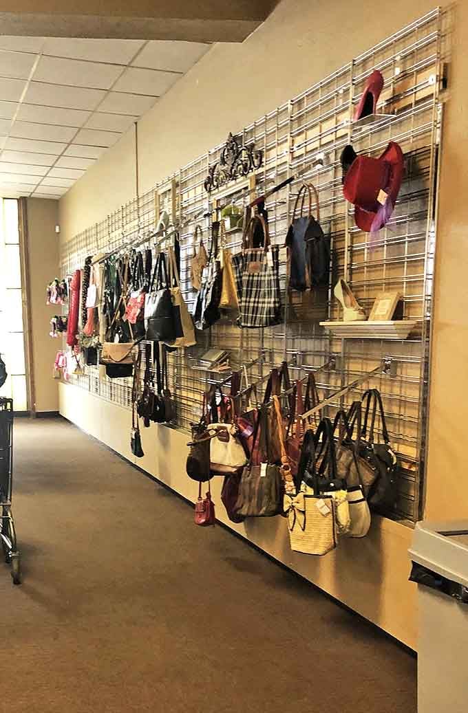 Handbag heaven! This wall display showcases purses of every shape and style, from practical totes to evening clutches.