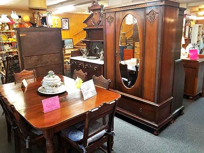 That wardrobe isn't just furniture—it's practically a portal to Narnia. The dining set looks ready to host a Victorian dinner party tonight.