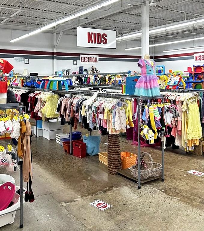 Colorful children's clothes arranged with military precision – tiny fashion statements waiting for their next big playground debut.