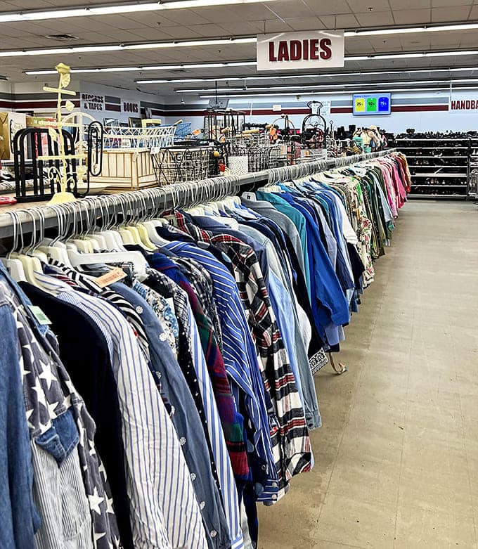 Endless racks of button-downs and blouses create a textile sea where yesterday's fashion finds new life and new owners.