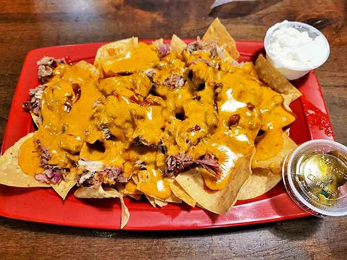 Cheese-draped nachos that require a strategy to eat. These loaded BBQ nachos aren't first-date food unless you're ready for commitment.