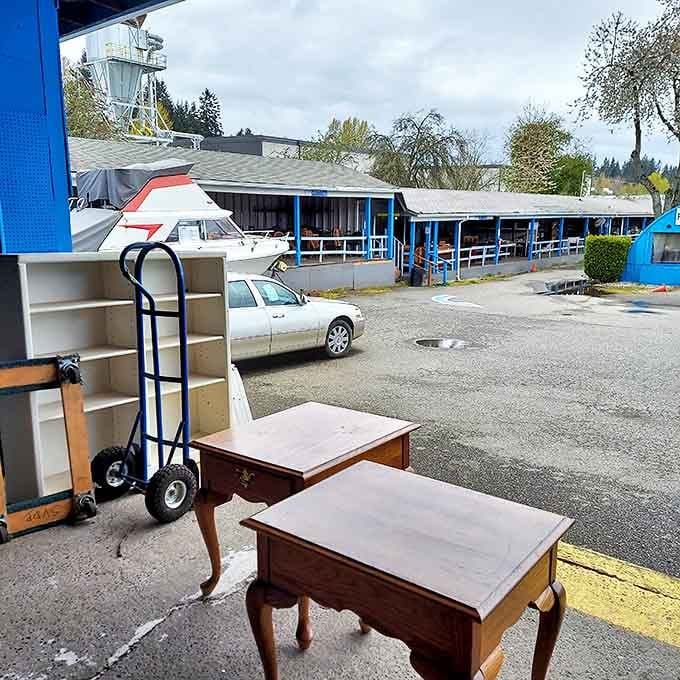 Furniture migration in progress&mdash;these solid wood pieces taking a breather in the parking lot before finding their forever homes.