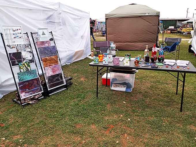Art under the open sky – these outdoor vendors transform ordinary tables into galleries of possibility and color.