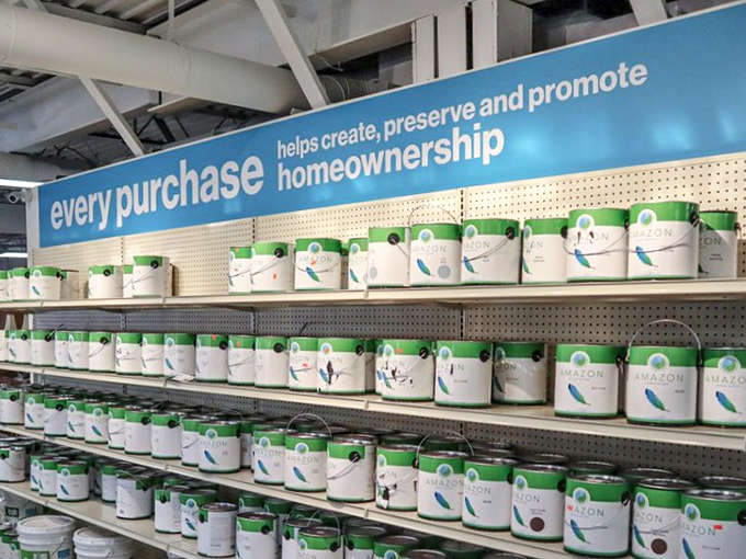 Paint paradise: Rows upon rows of possibilities for your walls. Each can represents someone's abandoned project and your next weekend masterpiece.