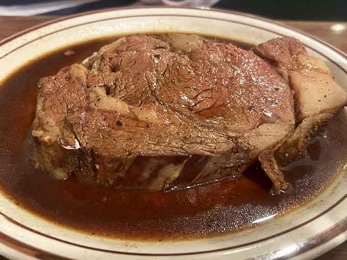 Behold the star of the show &ndash; prime rib bathing in its natural jus, a carnivore's dream that's worth every mile of the journey.