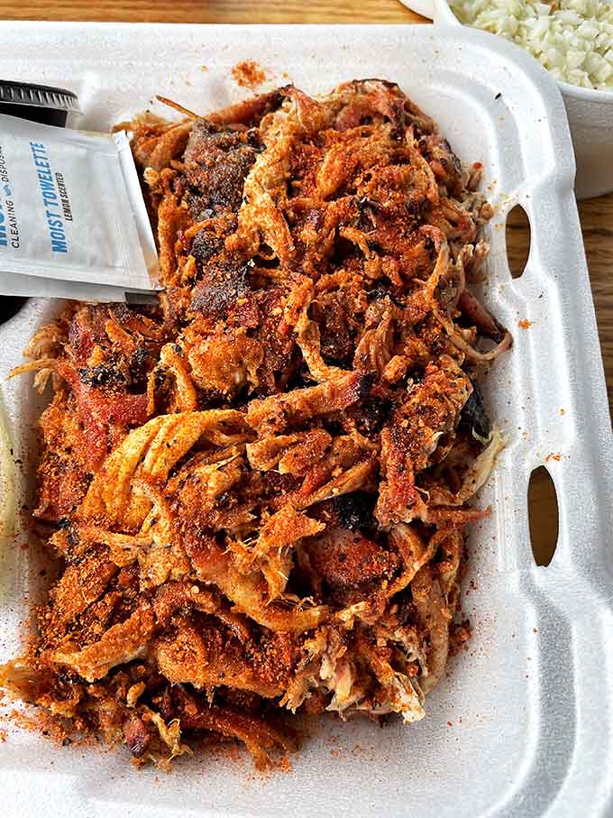 This pulled pork looks like it's been having a passionate affair with smoke and spice. The relationship is clearly working out.