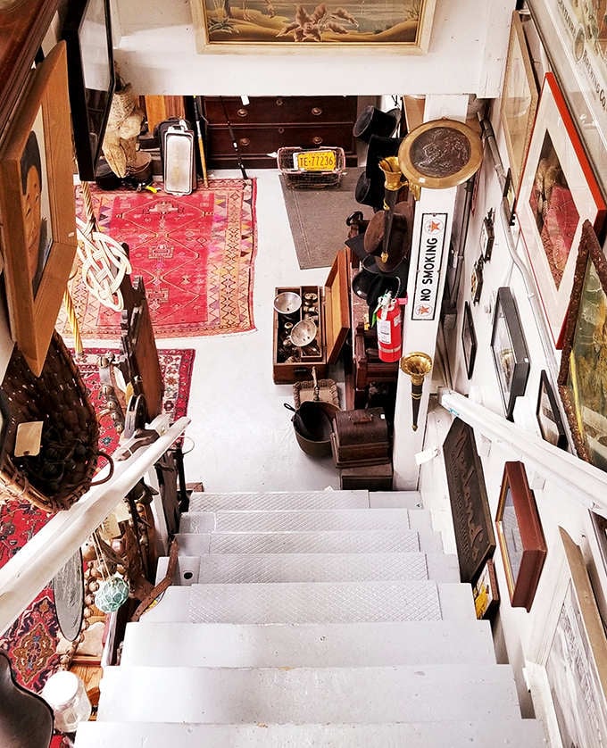 Looking down these stairs is like peering into a well-organized rabbit hole of nostalgia, where every descent brings new discoveries.