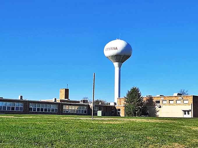 The iconic Smyrna water tower stands tall against the blue sky &ndash; the town's unofficial greeter and most reliable landmark.