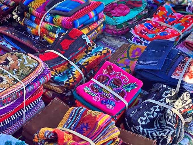 Handcrafted textile treasures in every color imaginable. Each pouch tells a story of artisanship that your smartphone would be honored to call home.